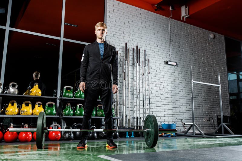 The Girl is Getting Ready for the Exercise with the Trainer Stock Photo ...