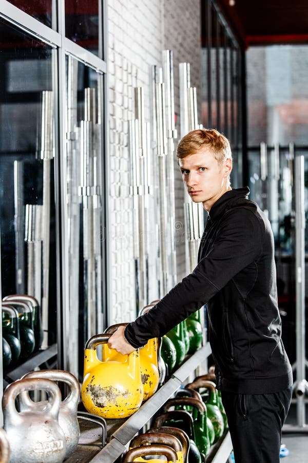 The Girl is Getting Ready for the Exercise with the Trainer Stock Image ...