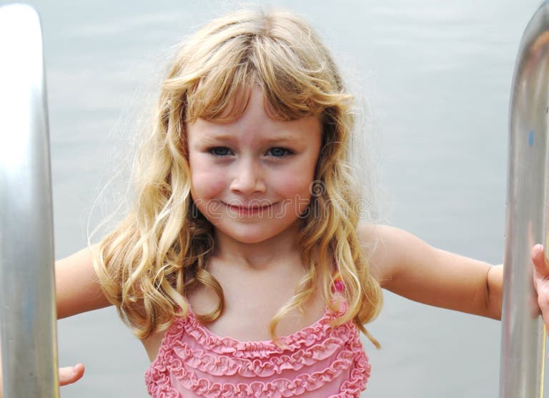 Young Girl Getting into Water Stock Image - Image of nature, activity ...