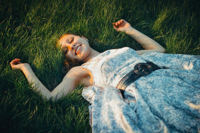 Young girl on the grass stock image. Image of adult, lifestyles - 38291685