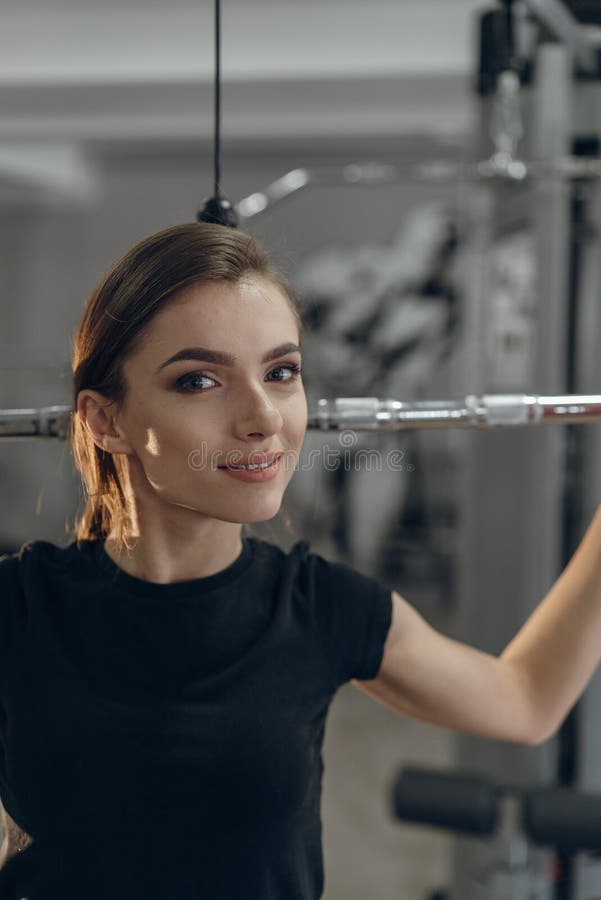 Young Girl in the Gym Performing Exercises Stock Image - Image of ...