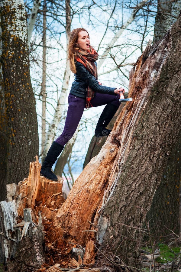 Young girl hacking tree stock image. Image of tool, lifestyle - 105952913