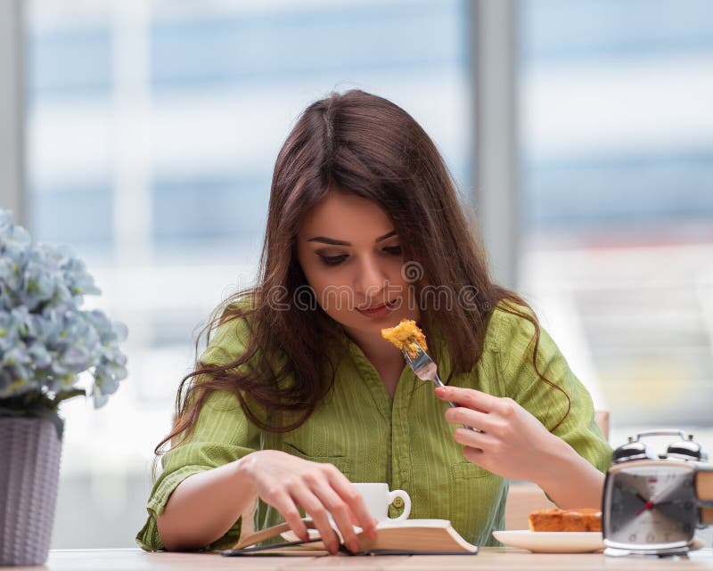 Young Girl Having Breakfast at Home Stock Photo - Image of caucasian ...