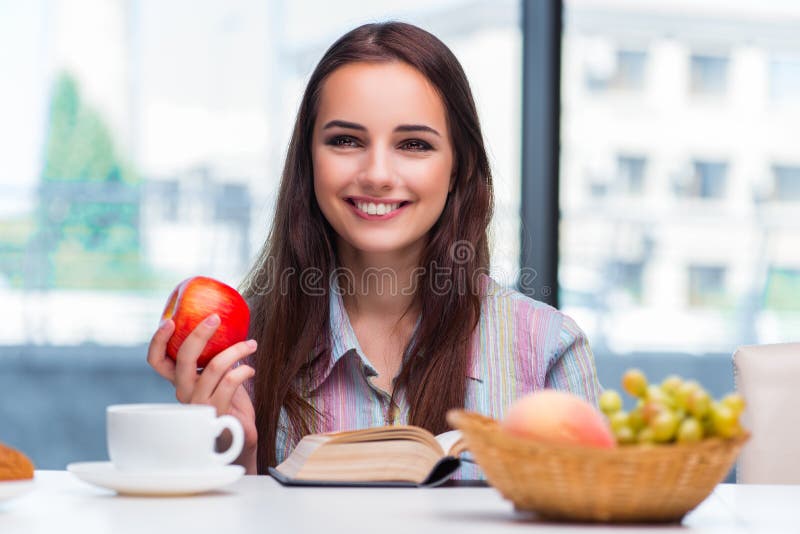 The Young Girl Having Breakfast on the Morning Stock Image - Image of ...