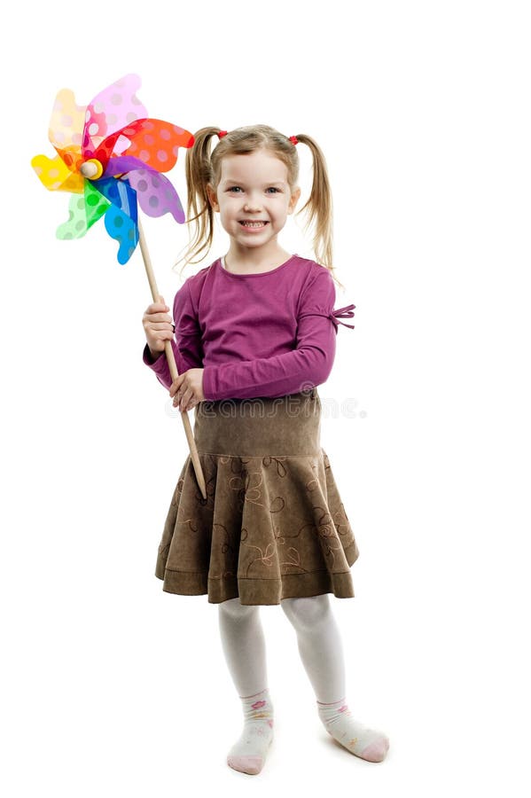 Young Girl Holding a Pinwheel Stock Photo - Image of holding, female ...