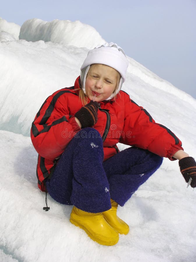Young girl with icicle stock image. Image of pack, winter - 130233