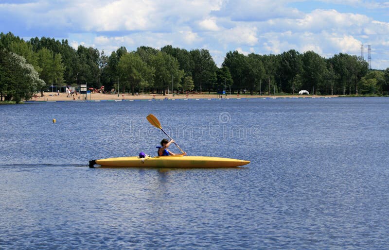 Young Girl Kayaking at Beach Stock Image - Image of young, outdoors ...