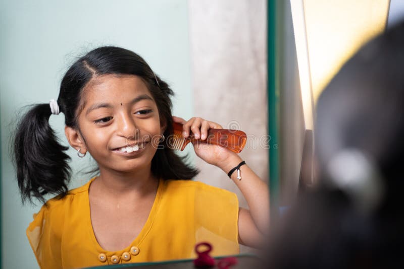 Young Girl Kid Getting Ready by Brushing Hair with Comb in Front of ...