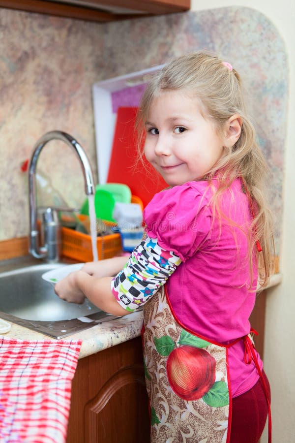 Young Girl In The Kitchen Washing Dishes Stock Image Image Of