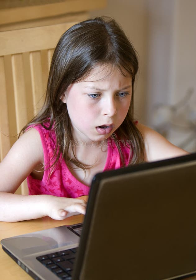 Young Girl on Laptop - Shocked Face Stock Image - Image of pink ...