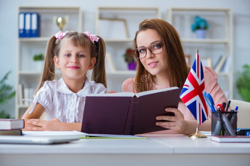 The Young Girl Learning English with Teacher Stock Photo - Image of ...