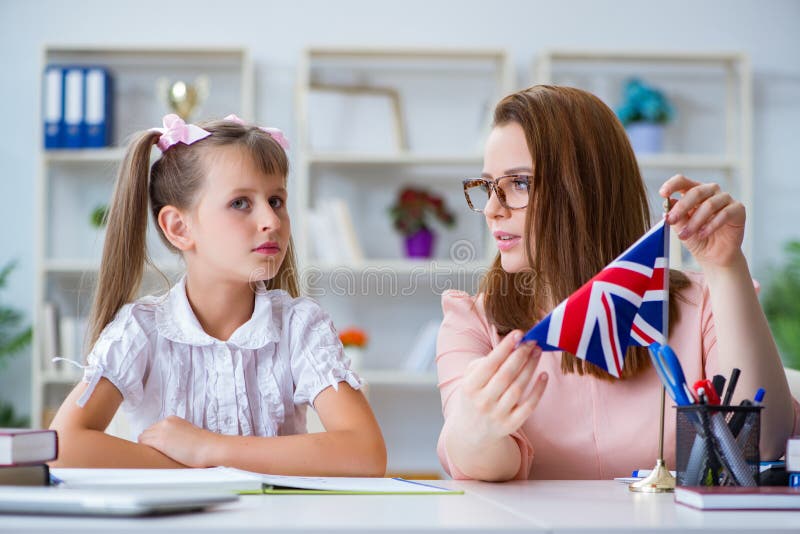 The Young Girl Learning English with Teacher Stock Photo - Image of ...