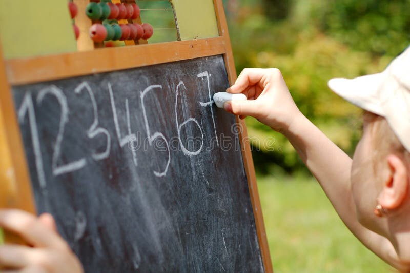 Young Girl Learning Numbers Stock Photo - Image of homework, school ...