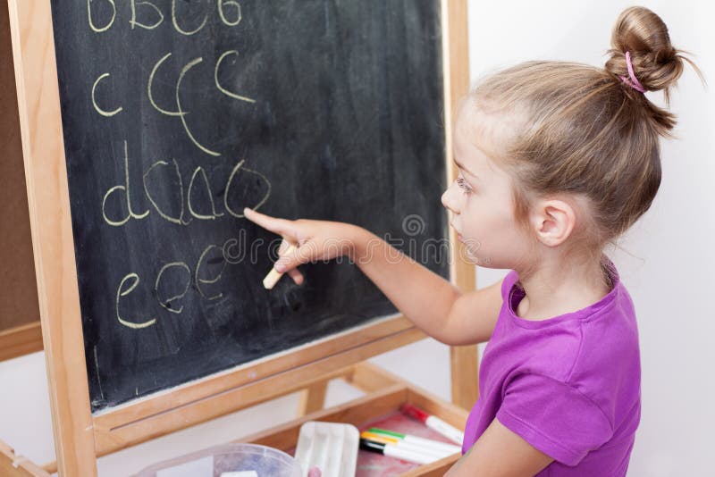Young Girl Learning Write Letters Blackboard Stock Photos - Free ...
