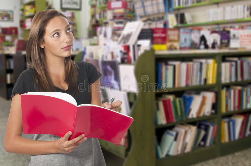 Young girl in library stock photo. Image of cheerful - 51739666
