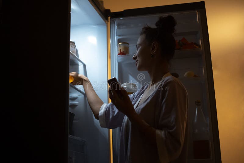 Young Girl Looking in Fridge at Night. Stock Photo - Image of meal ...