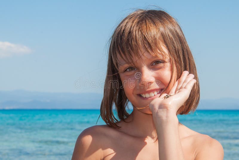 Young Girl Looking for Seashells at the Beach Stock Photo - Image of ...