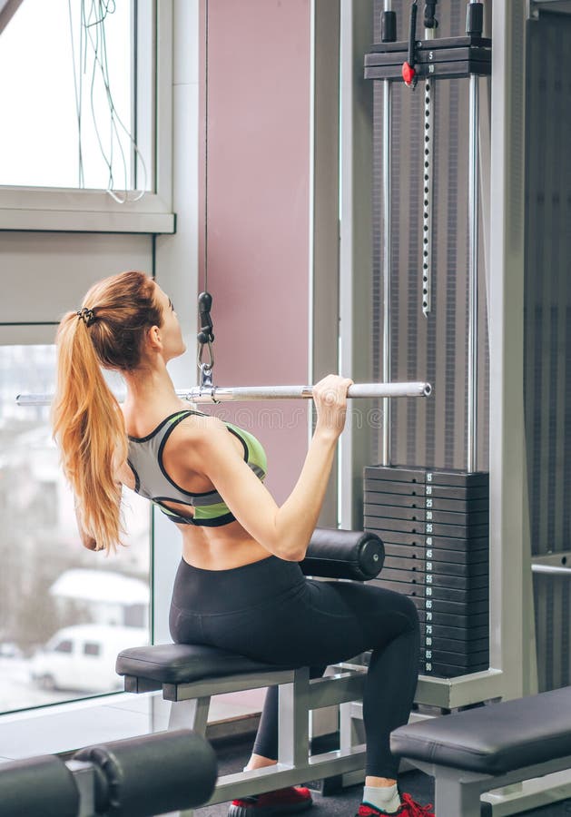 Young Girl Makes Exercises at the Gym Stock Photo - Image of dumbbell ...