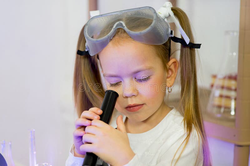 Young Girl Making Science Experiments Stock Image - Image of equipment ...