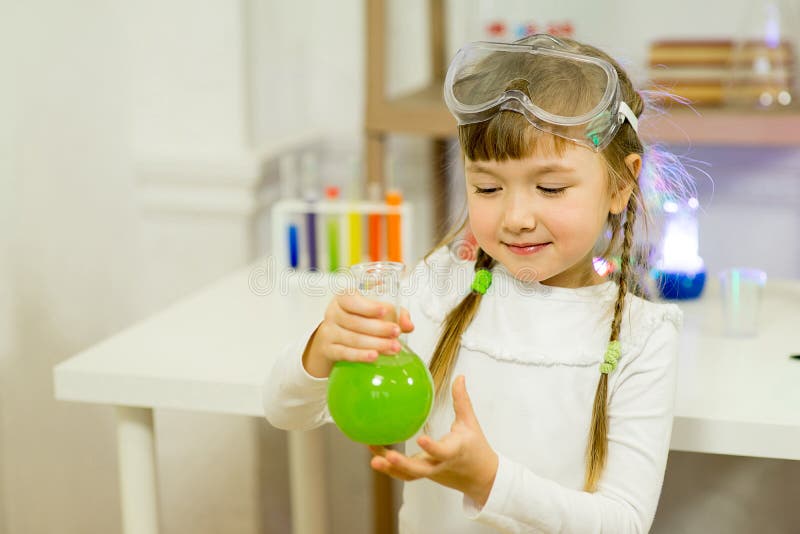 Young Girl Making Science Experiments Stock Photo - Image of kids ...