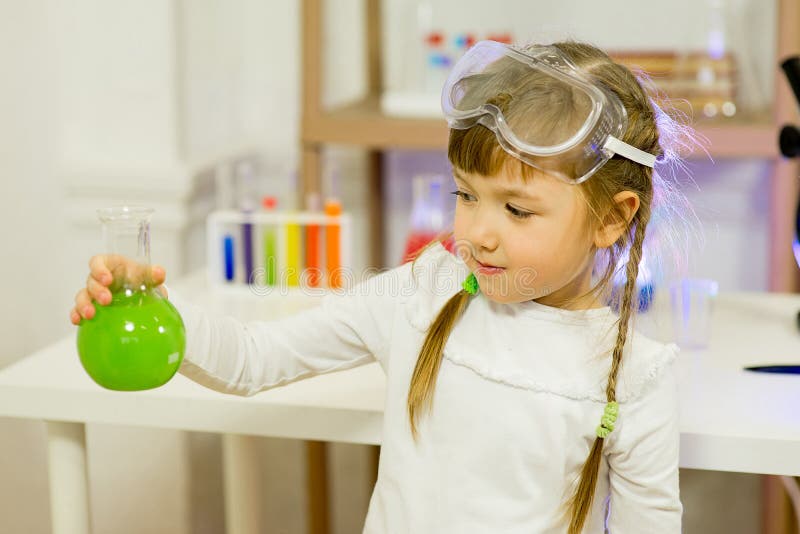 Young Girl Making Science Experiments Stock Photo - Image of emotional ...