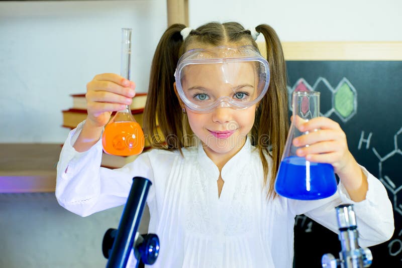 Young Girl Making Science Experiments Stock Photo - Image of microscope ...