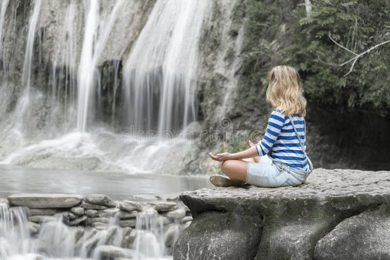 Young Girl Meditating at the Waterfall Stock Image - Image of girl ...