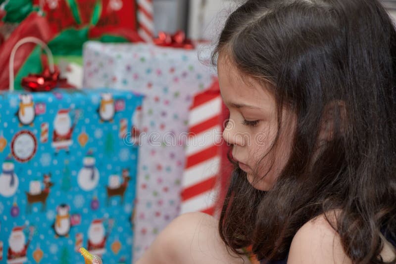 Young Girl Opening Presents on Christmas Stock Image - Image of ...