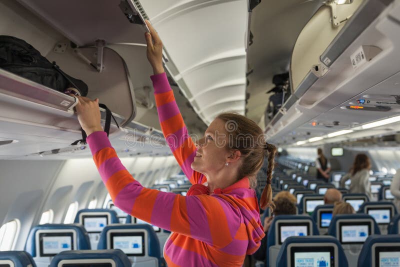 The Young Girl Placed Her Hand Luggage Stock Photo - Image of locations ...
