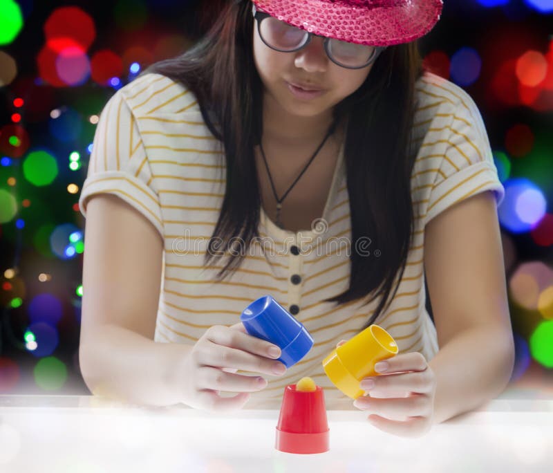 Trick with three cups stock image. Image of magician - 54315487