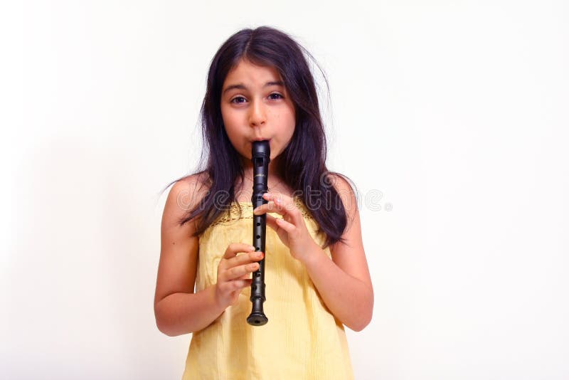 Young Girl Playing Recorder Stock Image - Image of band, brightly: 5929041