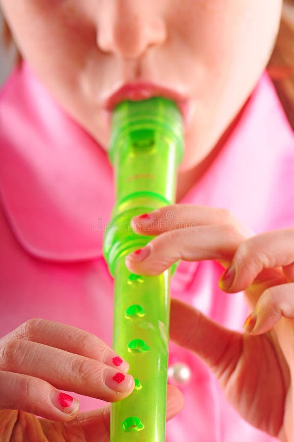 Young Girl Playing Recorder Stock Image - Image of fingernail, blow ...