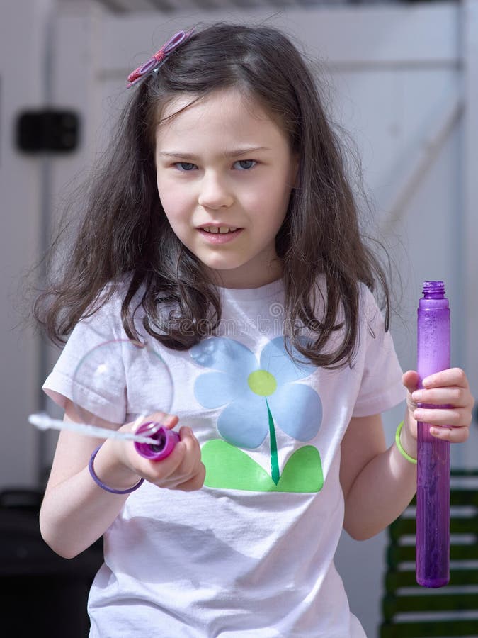 Young Girl Playing with Soap Bubbles Stock Photo - Image of pretty ...