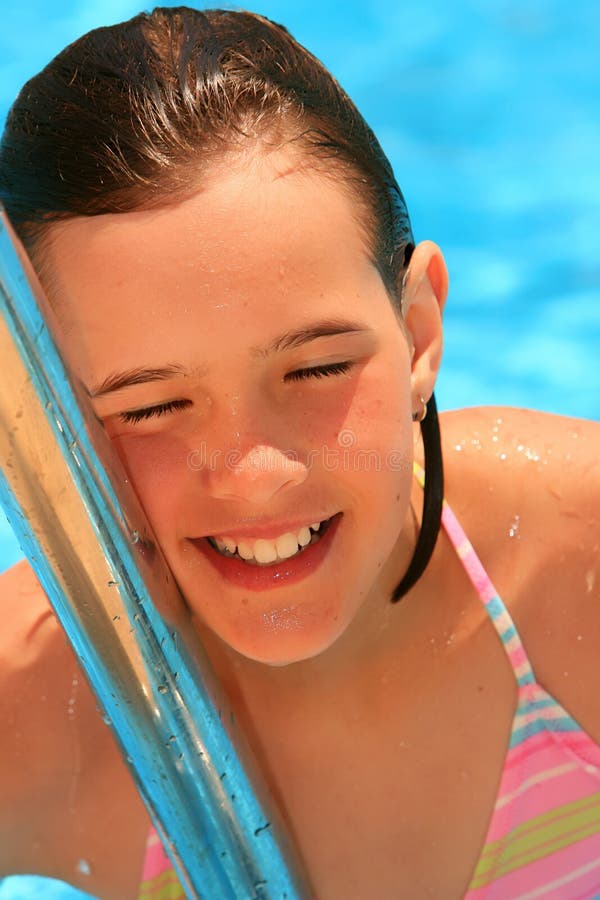 Young girl in the pool stock image. Image of face, beautiful - 5473339