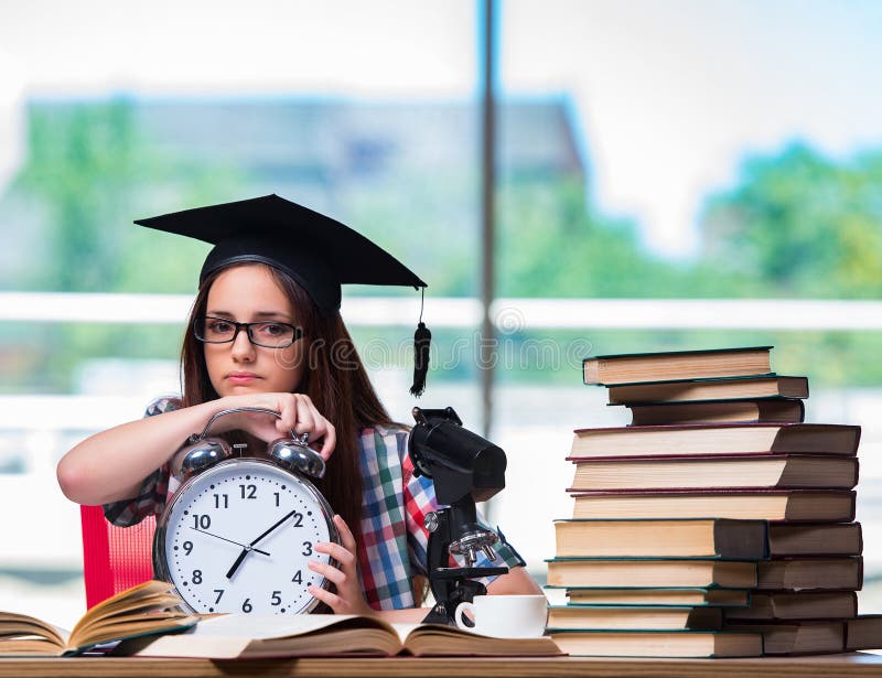 Young Girl Preparing for Exams with Large Clock Stock Photo - Image of ...