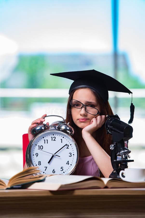 The Young Girl Preparing for Exams with Large Clock Stock Image - Image ...
