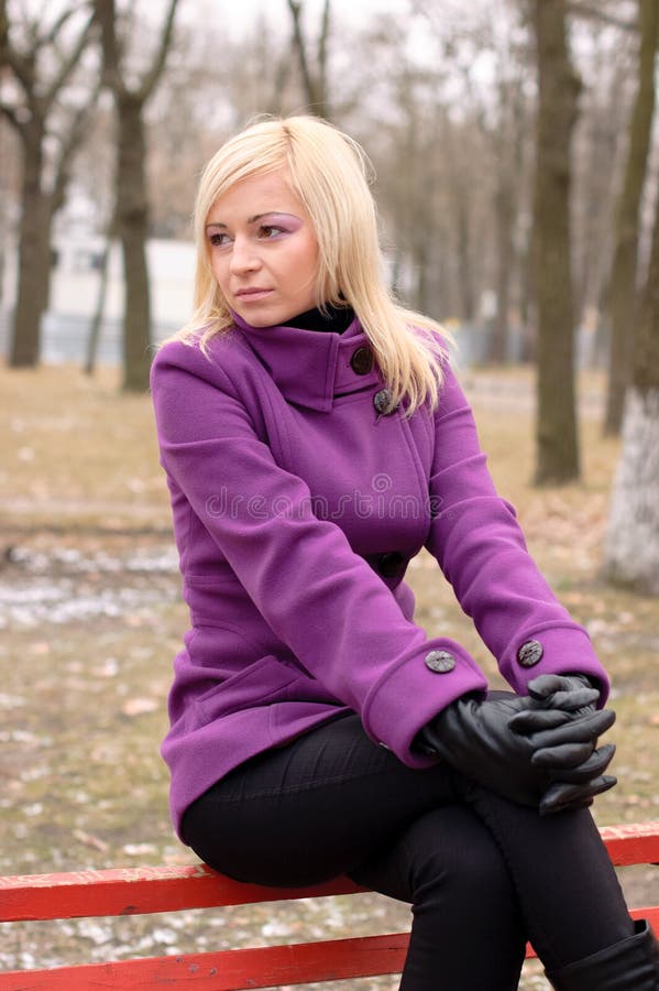 Young Girl in a Purple Coat Stock Image - Image of confidence, blonde ...