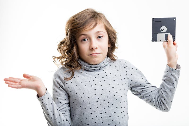 Young Girl Questioning Floppy Disk Stock Image - Image of confused ...