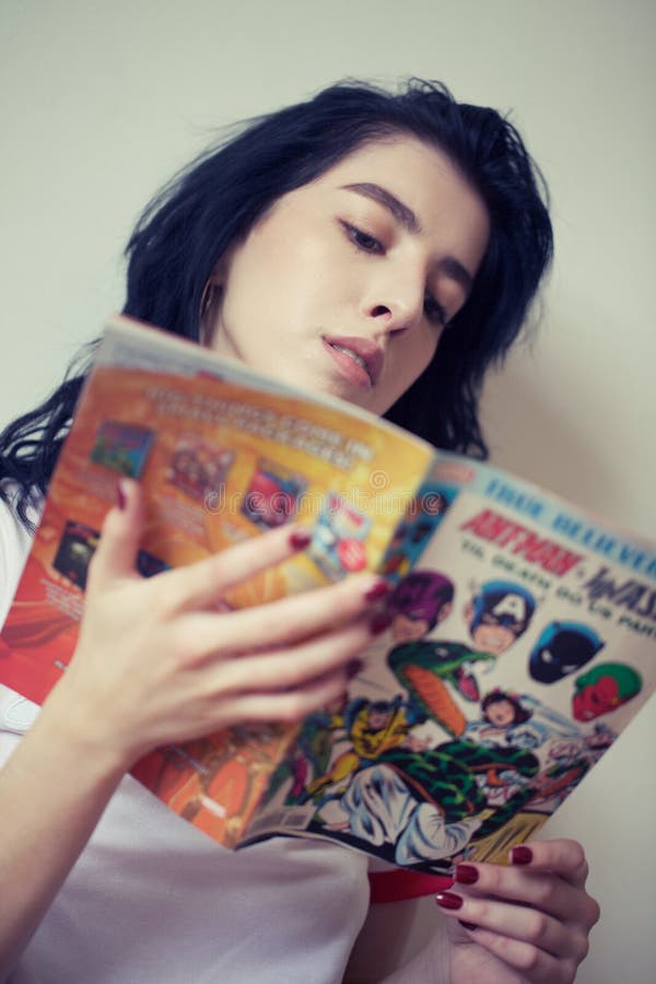 Girl reading comics editorial image. Image of superhero - 146576165