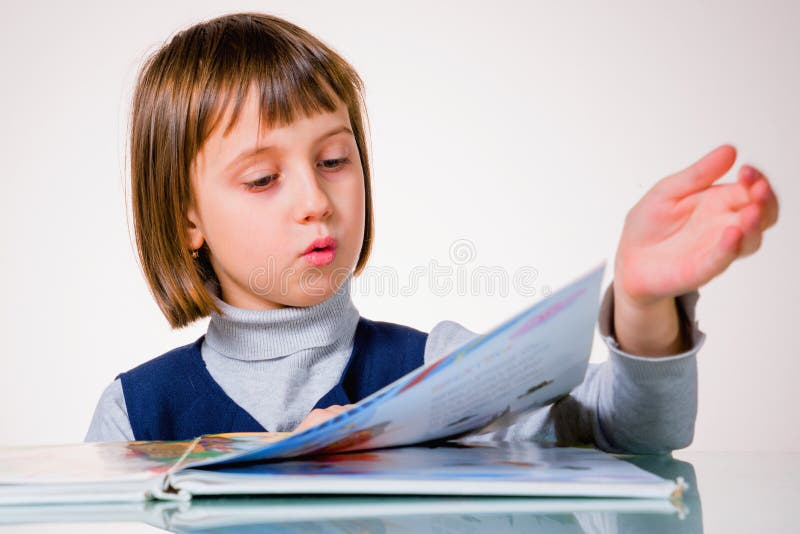 Young Girl Reading a Book. Learning, Knowledge and Development Concept ...