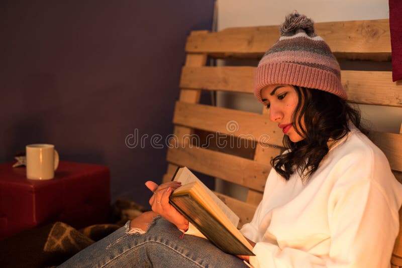 Young Girl Reading a Book on a Winter Night Stock Image - Image of book ...