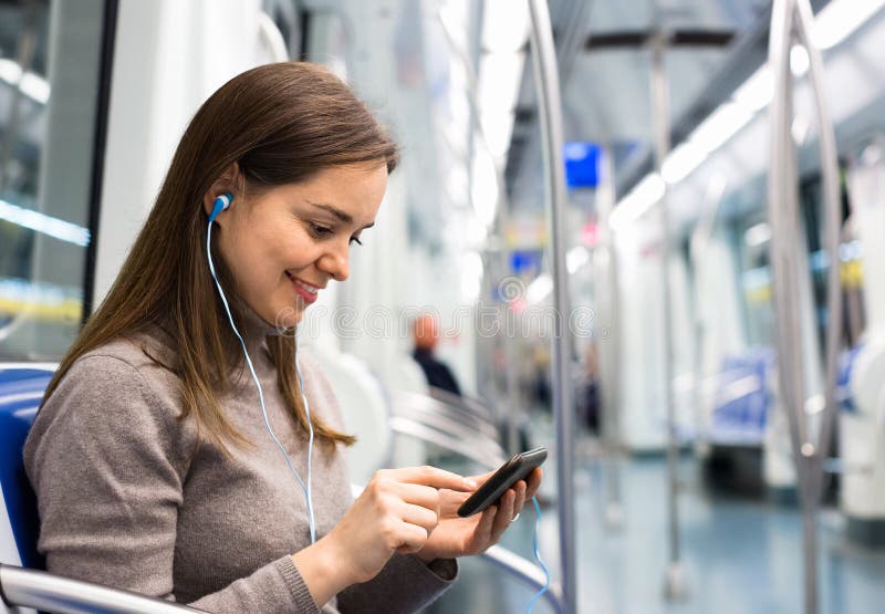 Young Girl Reading from Mobile Phone Screen Stock Photo - Image of ...