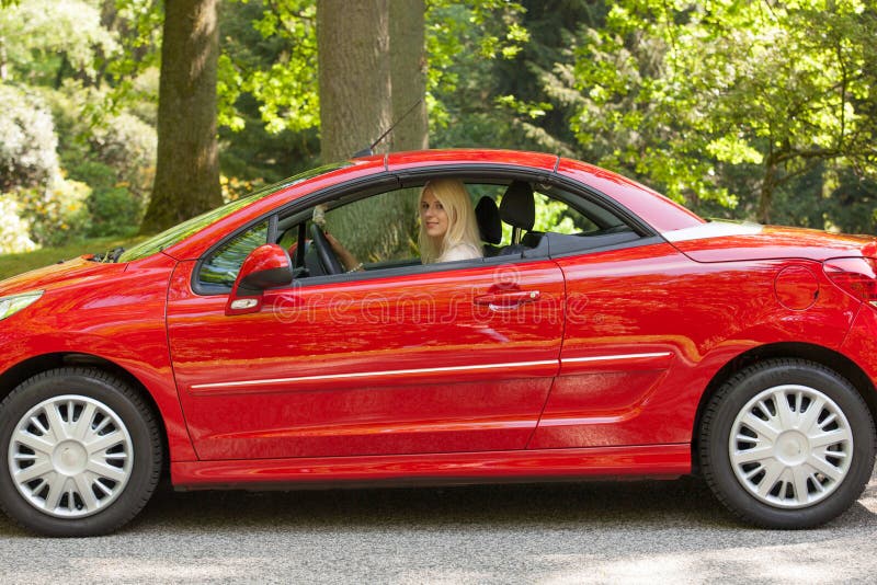 A Young Girl with a Red Car Stock Image - Image of white, outside: 24979365