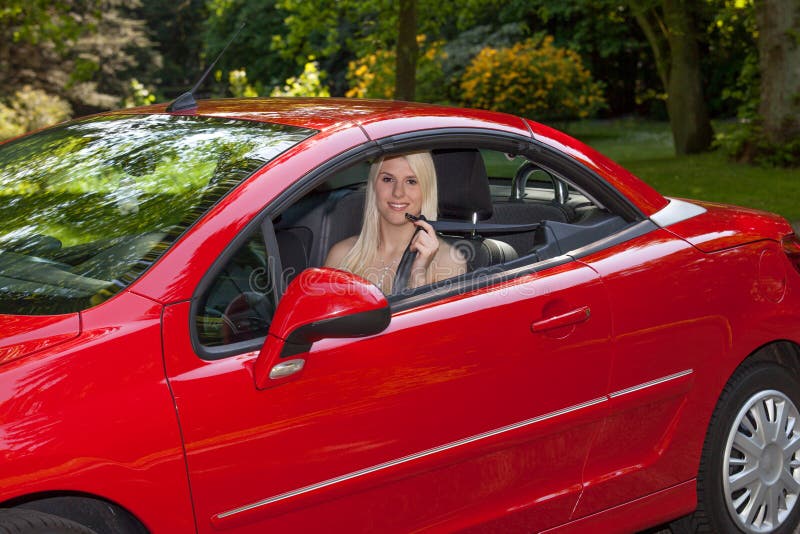 A Young Girl with a Red Car Stock Photo - Image of beautiful, holiday ...