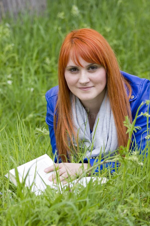Young Girl with Red Hair Reading a Book Stock Photo - Image of learning ...
