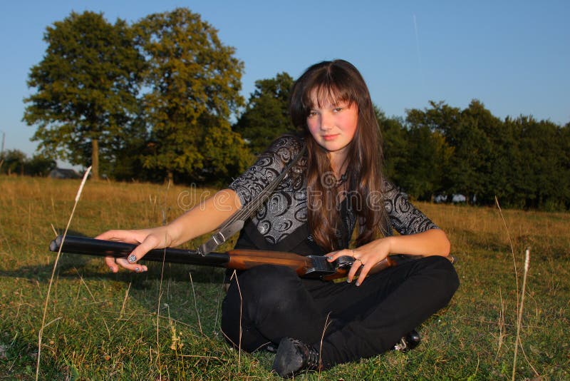 Young girl with rifle stock photo. Image of friends, girlfriends - 12343274