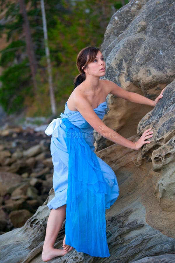 Young girl on the rock stock photo. Image of girl, nature - 11181706