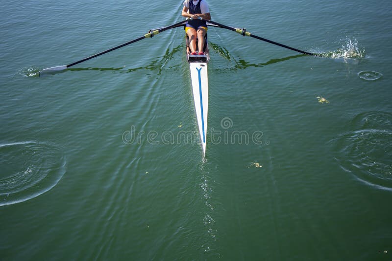 Girl rowing a boat stock image. Image of girls, park, athletic - 5977657