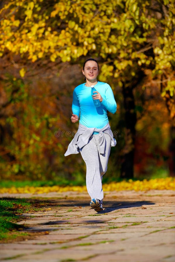 A young girl running stock image. Image of outside, exercise - 27407759
