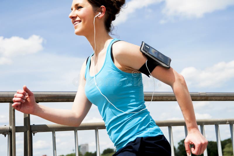 Young Girl Running in the City, Over the River by the Bridge Stock ...